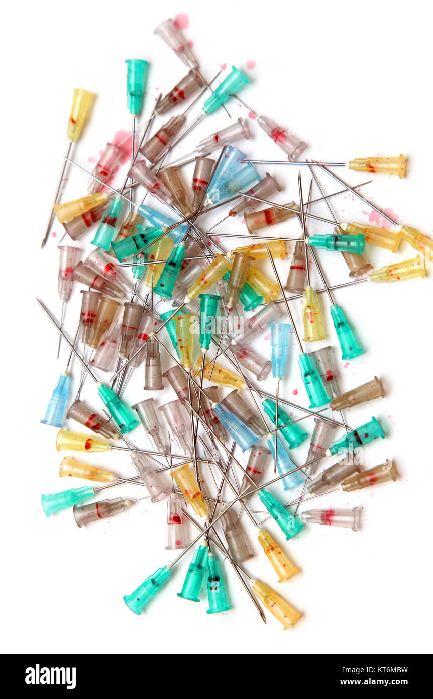Bunch of used needles with human blood Stock Photo - Alamy