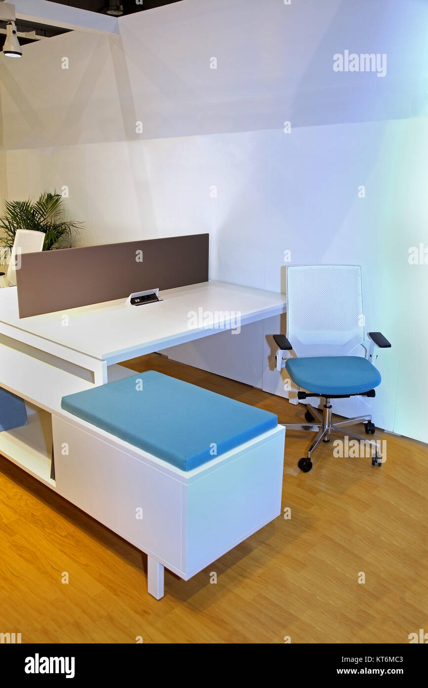 Office cubicle with modern chair and desk furniture Stock Photo - Alamy