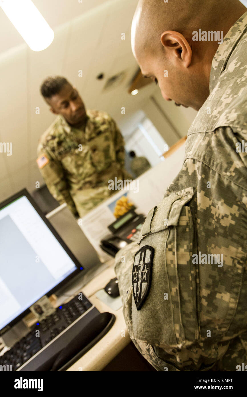Sgt. Jeffery Rayman, 7250th Medical Support Unit, provides guidance ...