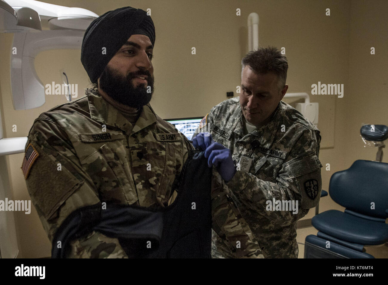 Sgt. Owen Roberts, 7250th Medical Support unit, performs an x-ray on ...