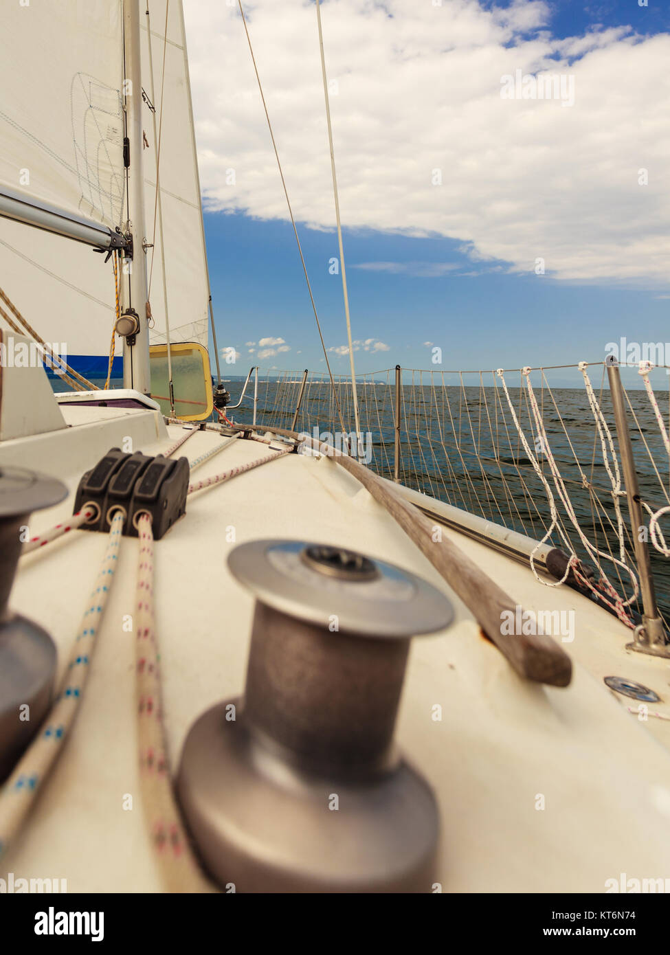 Yacht capstan with rope on sailing boat during cruise, marine objects ...