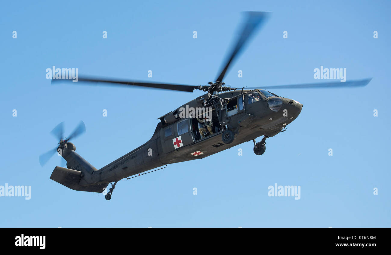 A helicopter transport descends onto a runway during the 6th Ranger ...