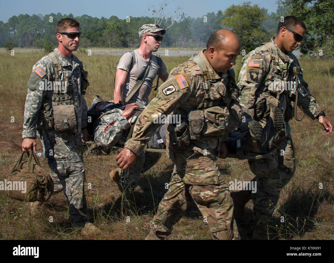 U.S. Army 6th Ranger Training Battalion members, carry a simulated ...