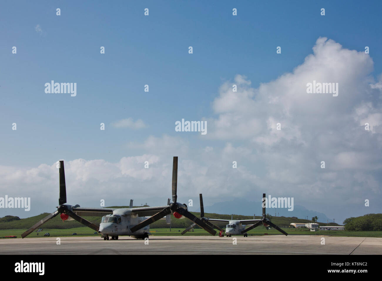 Two U.S. Marine Corps V-22 Ospreys are staged at Marine Aircraft Group ...