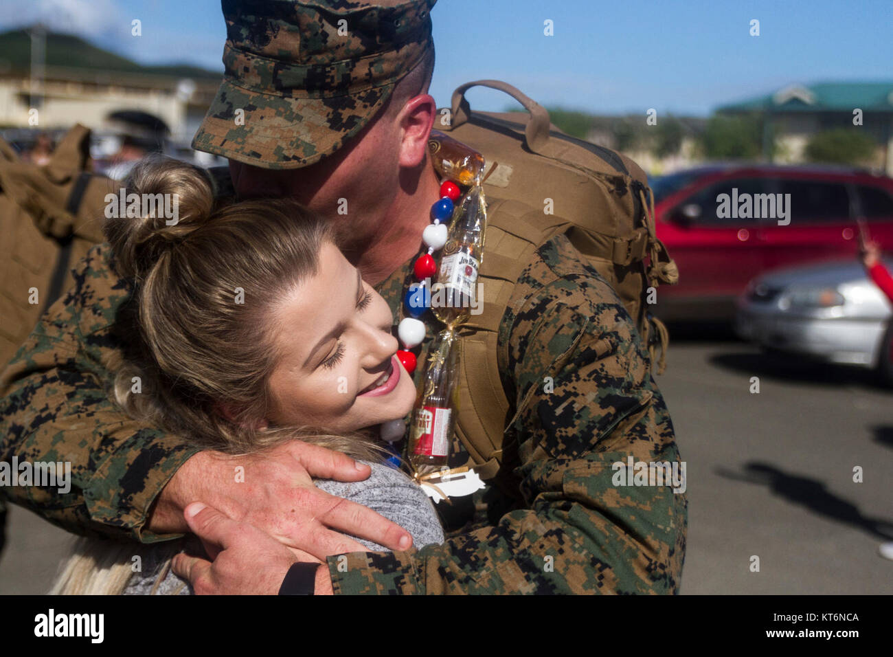 A U.S. Marine with 1st Battalion, 3rd Marine Regiment (1/3) hugs his ...