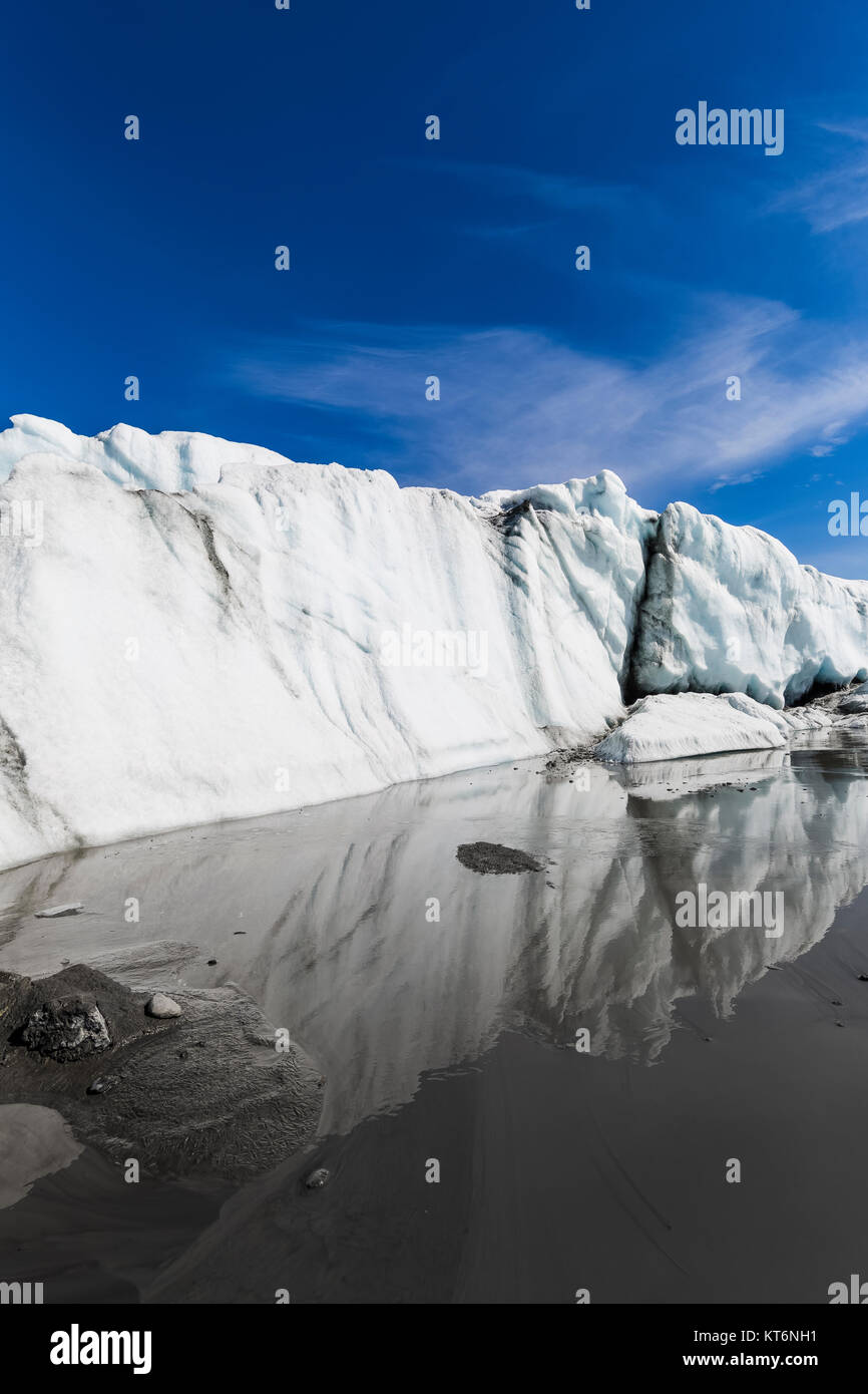 Melting water gathered into a glacial lake near the end of Matanuska ...