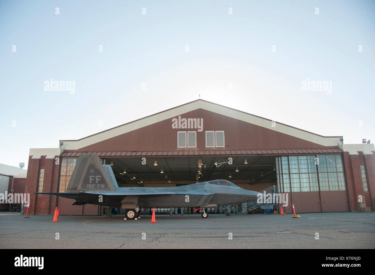 The 192nd Fighter Wing's flagship F-22A Raptor is parked outside of an ...