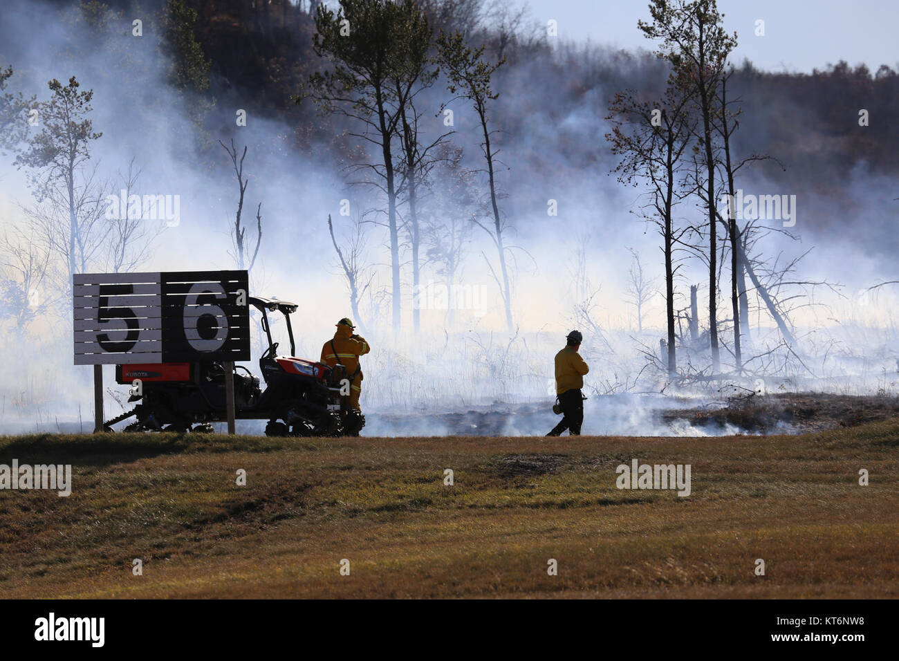 Post personnel oversee a prescribed burn Nov. 30, 2017, at Range 100 on ...