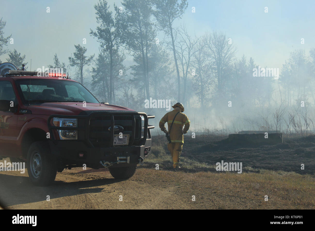 Firefighter Forrest Lefler oversees a prescribed burn Nov. 30, 2017, at ...