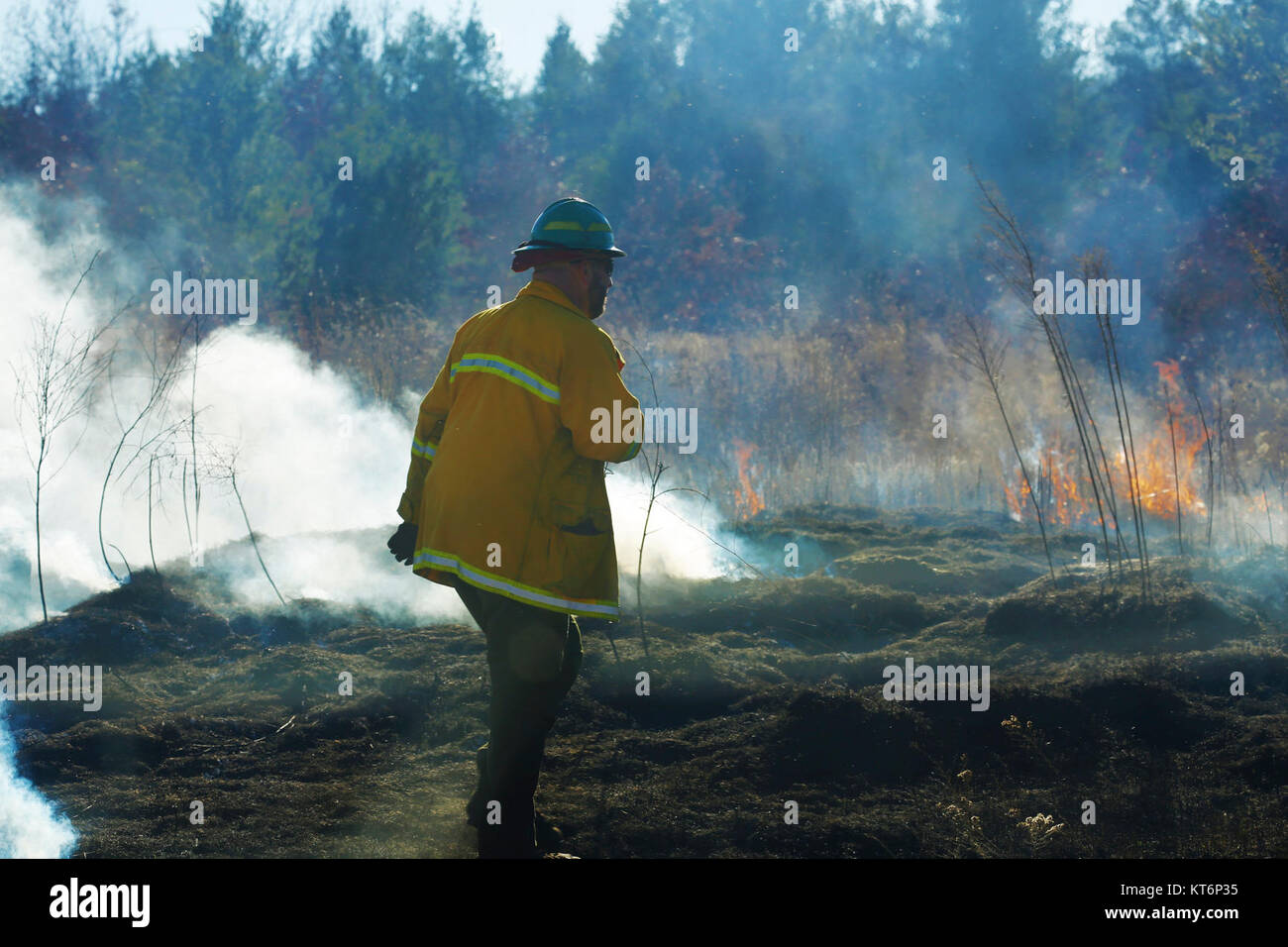 Post personnel oversee a prescribed burn Nov. 30, 2017, at Range 100 on ...
