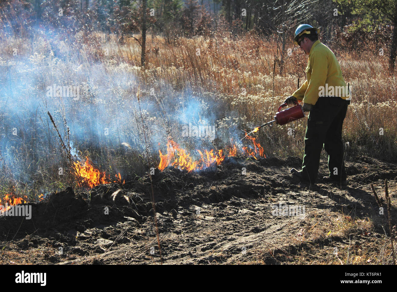Post personnel oversee a prescribed burn Nov. 30, 2017, at Range 100 on ...