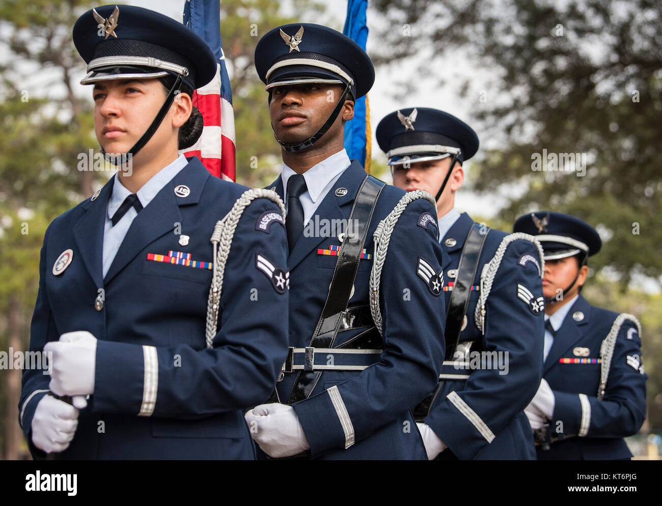 A flag detail stands ready to bring in the colors to the Team Eglin ...