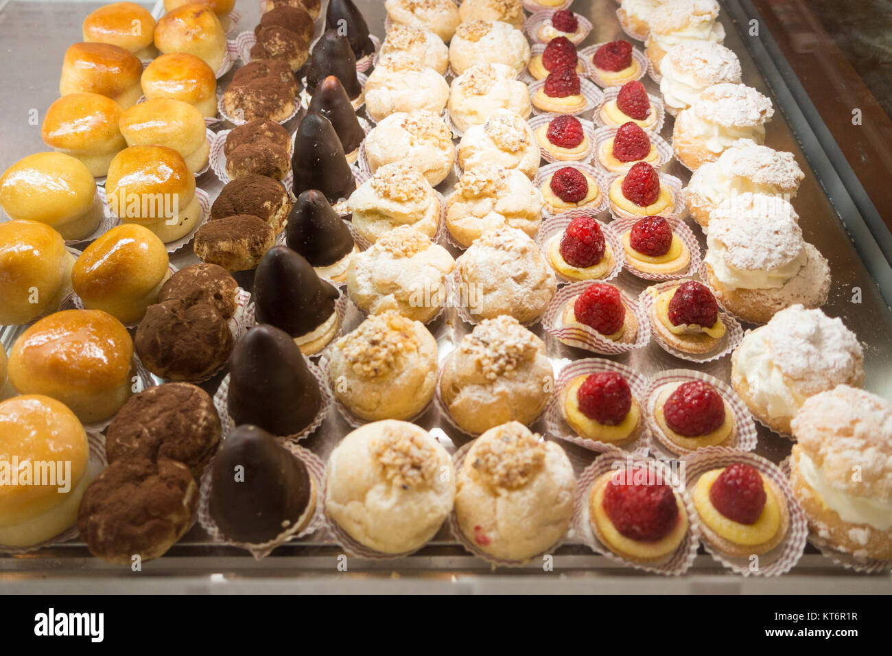 lots of backed pastries in a row Stock Photo - Alamy