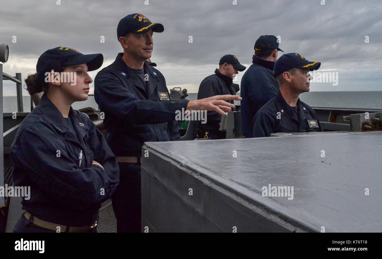 Commanding officer Cmdr. Jim Von St. Paul speaks to Lt. Ashley ...