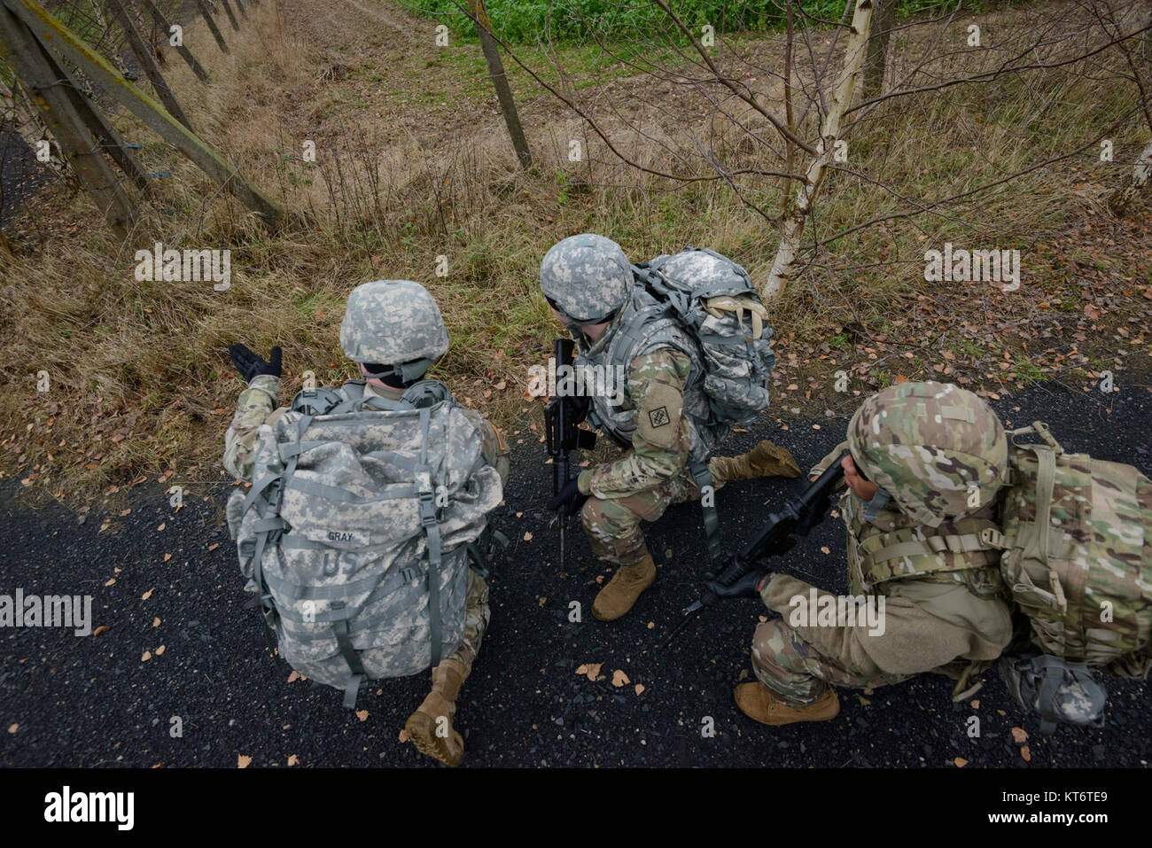U.S. Army Spc. Jonathan Gray (right), assigned to the U.S. Army Network ...