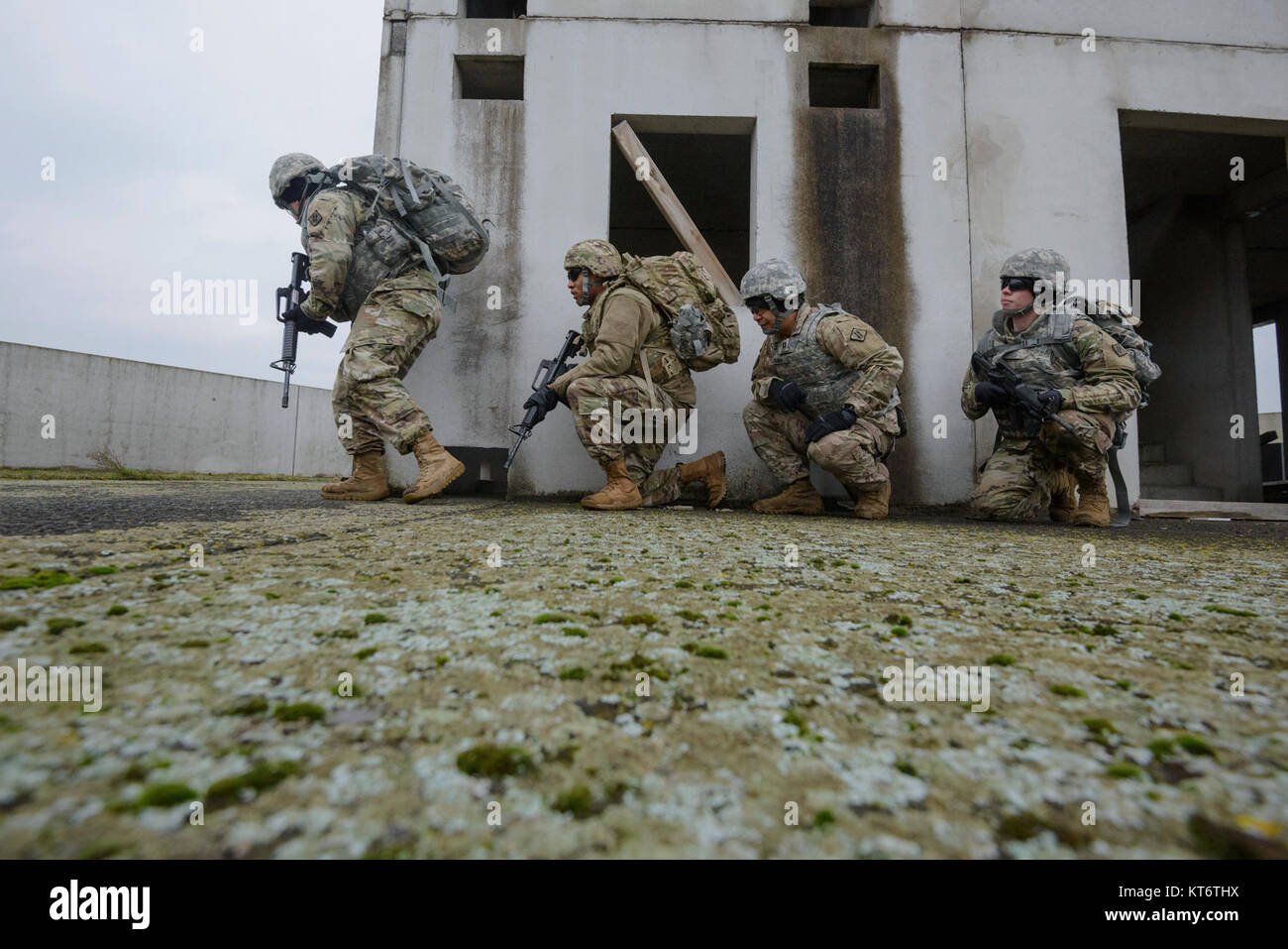 U.S. Army Spc. Jonathan Gray, right, with U.S. Army Network Enterprise ...