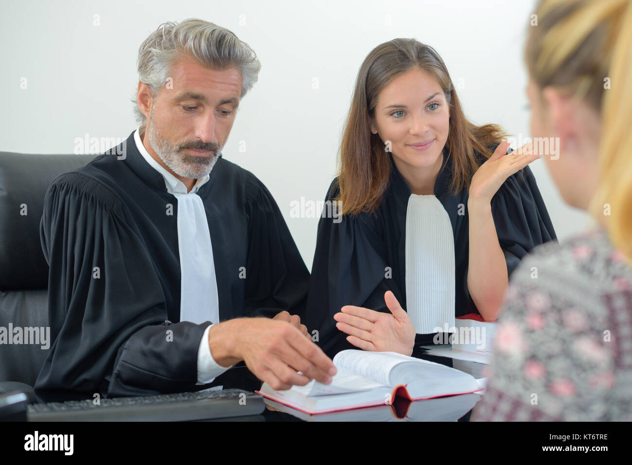 questioning the witness Stock Photo - Alamy