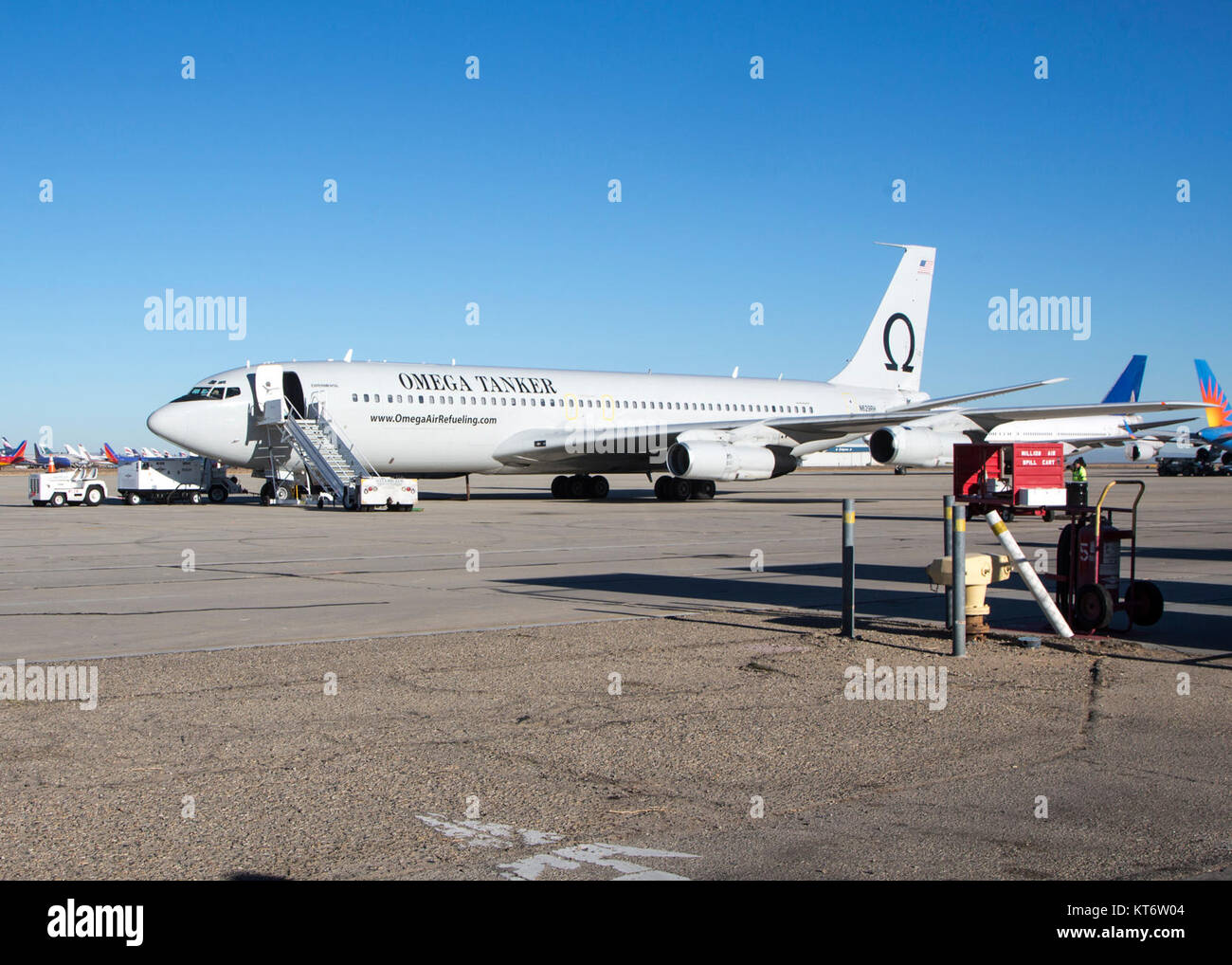 Civilian Aircraft Omega Tanker C-707 conducts an aerial refueling ...