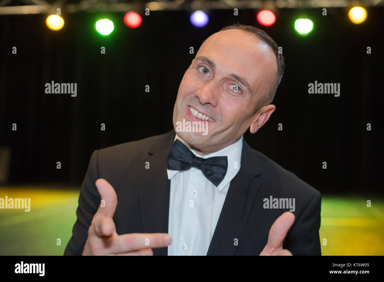 Portrait of male performer on stage Stock Photo - Alamy