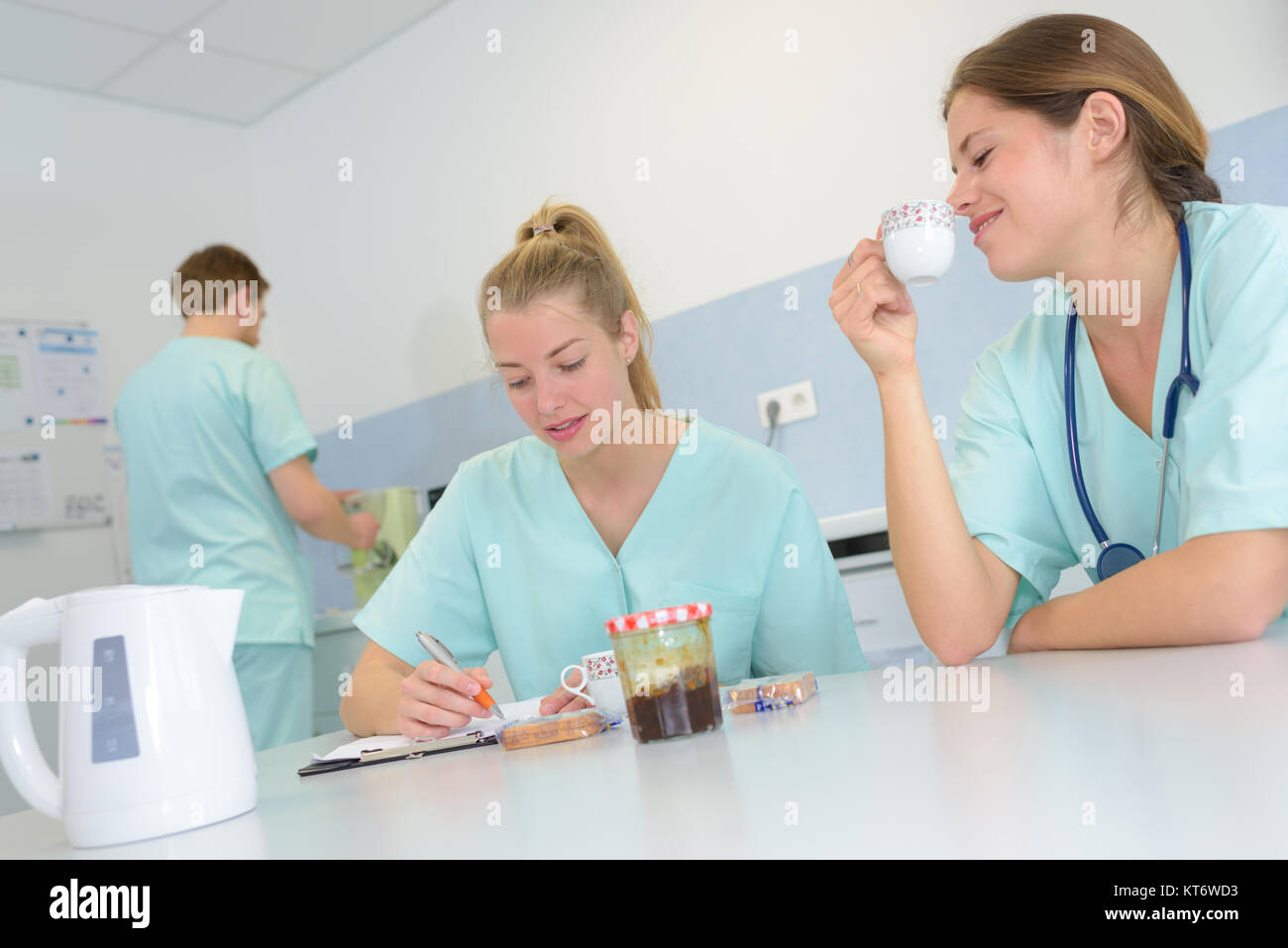doctors taking a break and consulting each other Stock Photo - Alamy