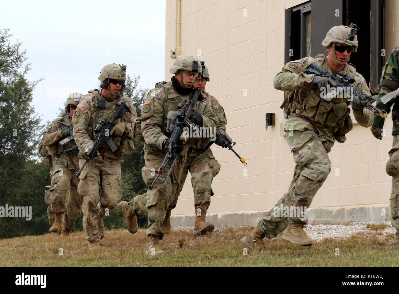 Troopers from 1st Squadron “Tiger,” 3rd Cavalry Regiment, maneuver ...