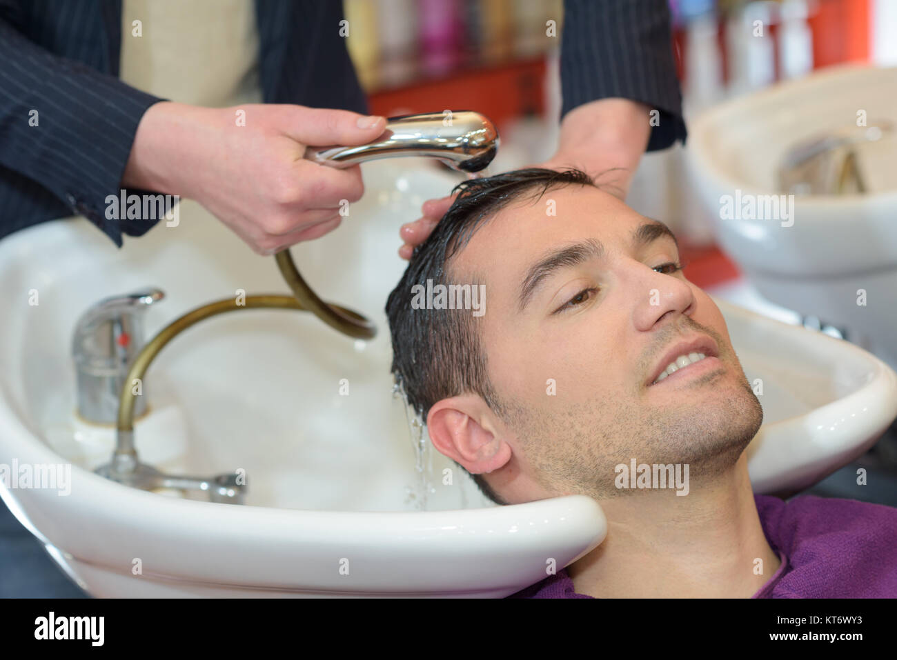 barber washing head client in barbershop Stock Photo - Alamy