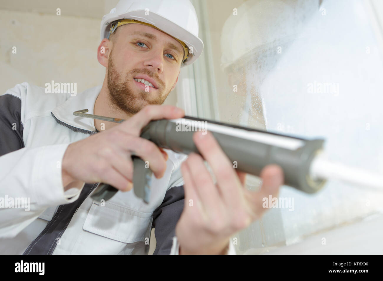 applying epoxy on the edge Stock Photo - Alamy