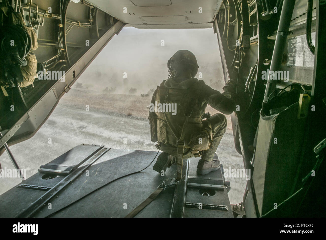 A U.S. Marine Corps air crew chief with Marine Aircraft Group 39 ...