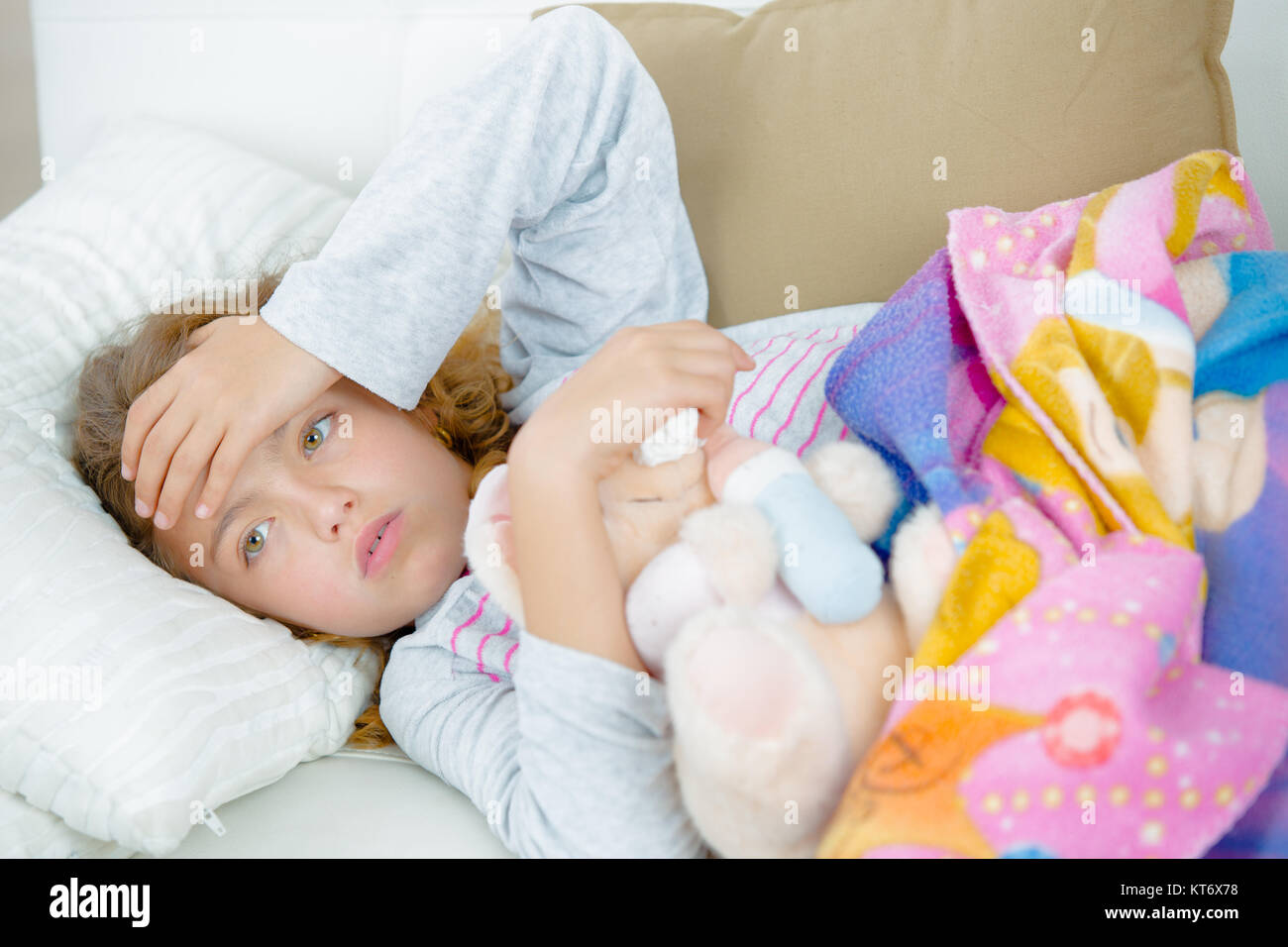 girl in bed with sickness Stock Photo - Alamy