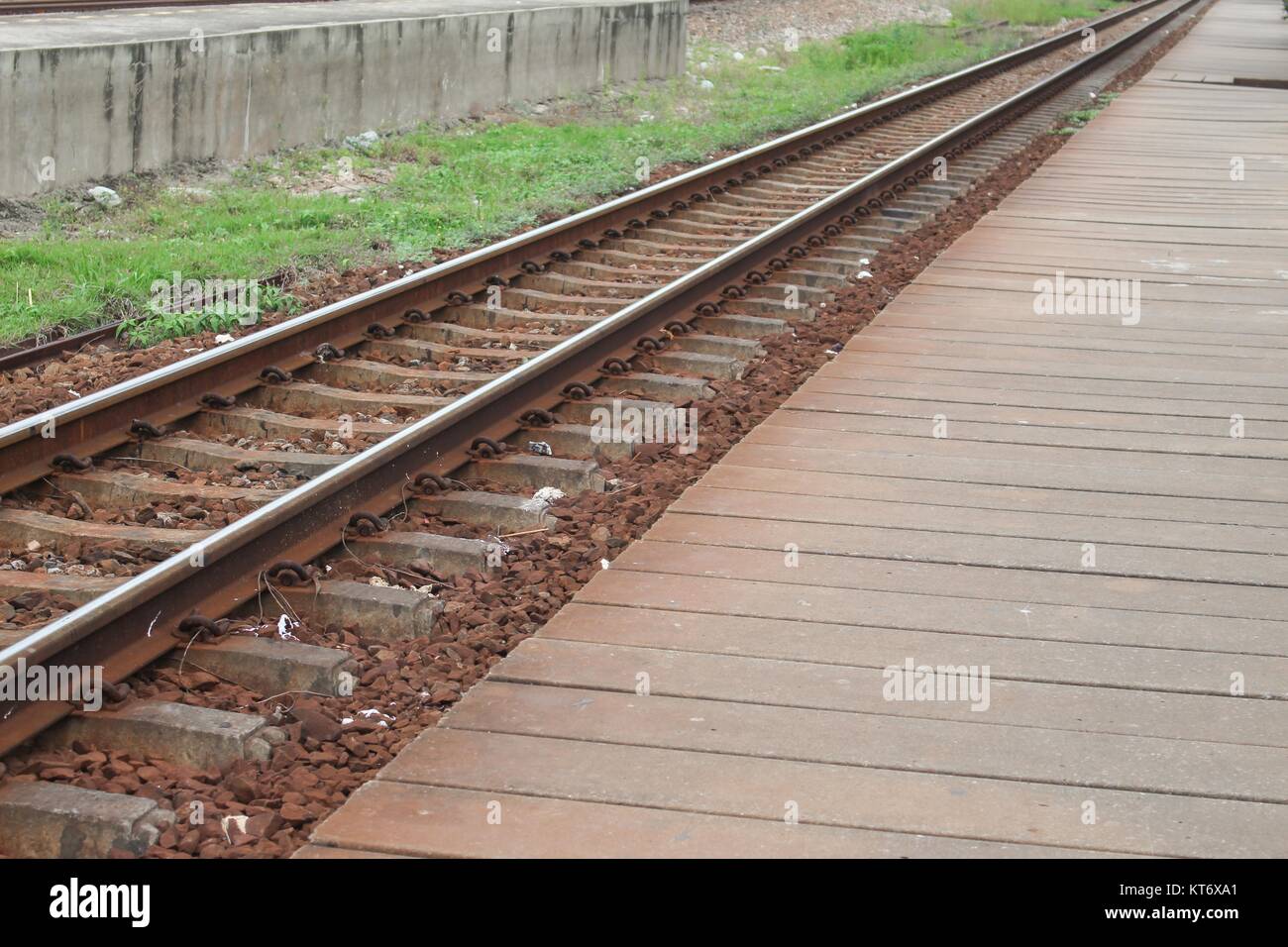 railway track on gravel for train transportation: Select focus with ...