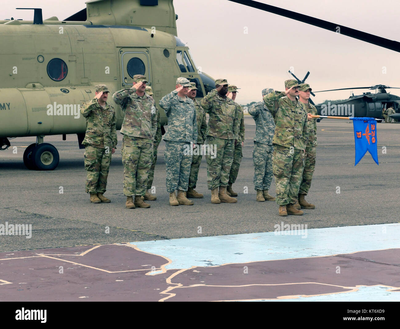 U.S. service members with 1st Battalion, 228th Aviation Regiment stand ...