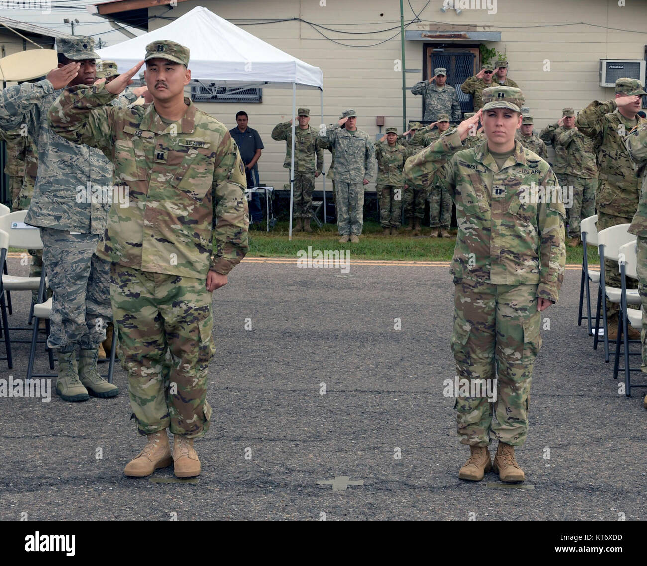 U.S. Army Capt. Nicholas K. Lee (left), outgoing Bravo Company, 1st ...