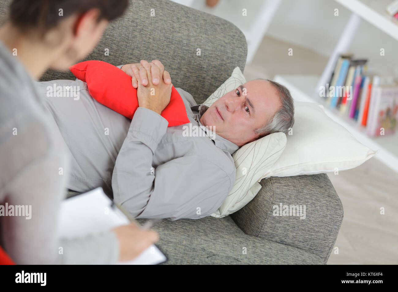 sad man explaining his feelings to professional psychologist Stock ...