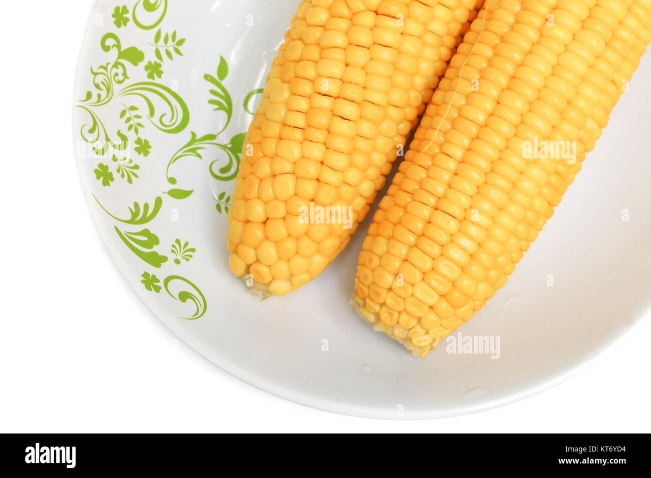corn boiled closeup on a plate on white background Stock Photo - Alamy