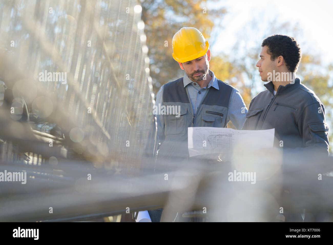 laborers outside a factory Stock Photo - Alamy