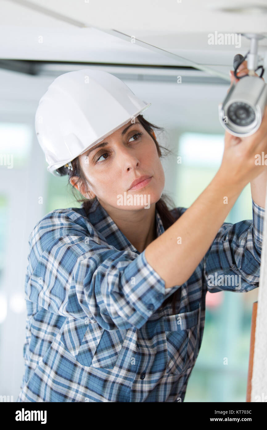 Female security guard checking hi-res stock photography and images - Alamy