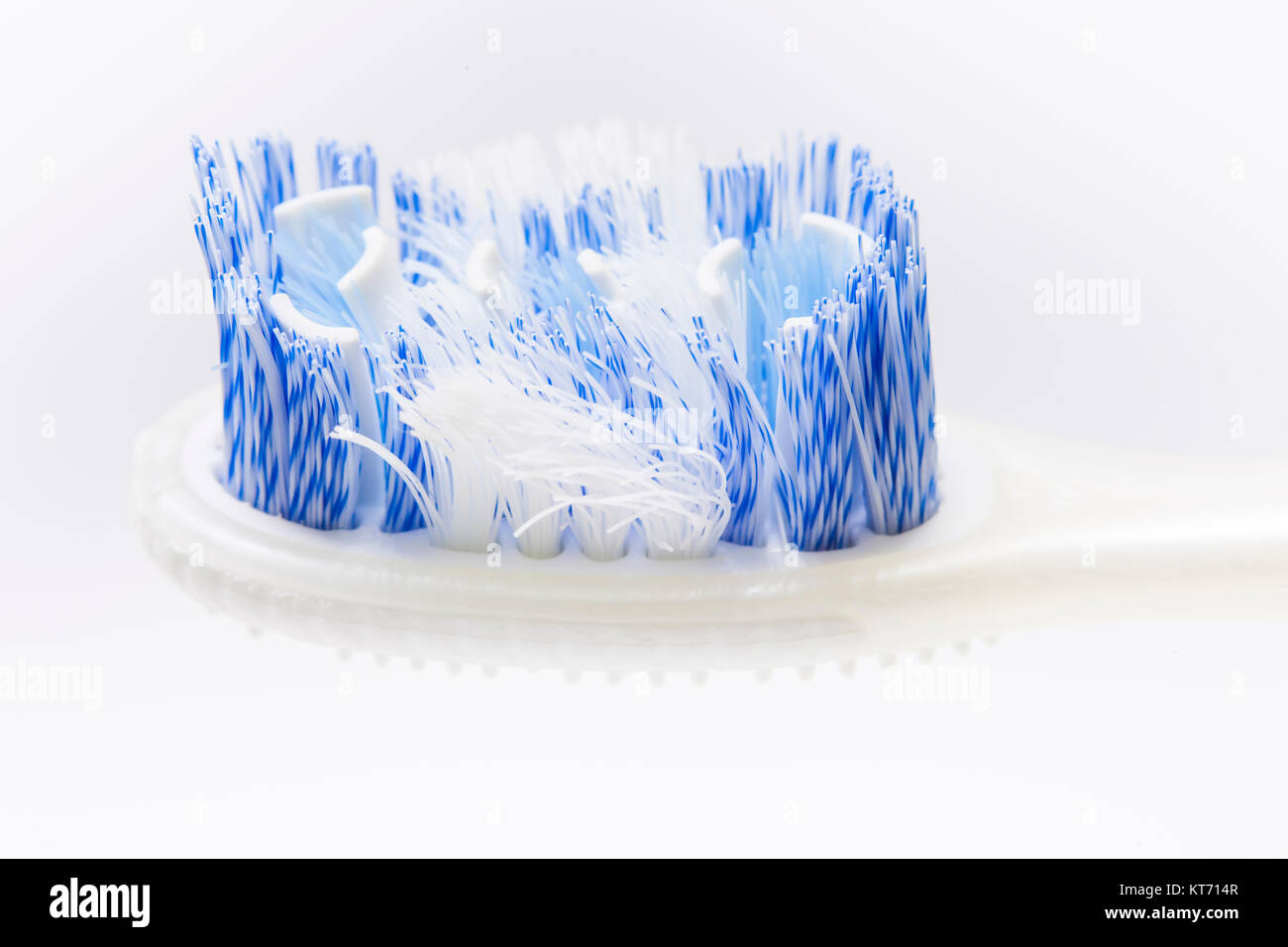 Close up of an old toothbrush on white background Stock Photo - Alamy