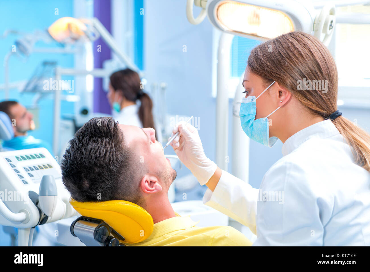 Doctor talking with her patient. Dentist concept Stock Photo - Alamy