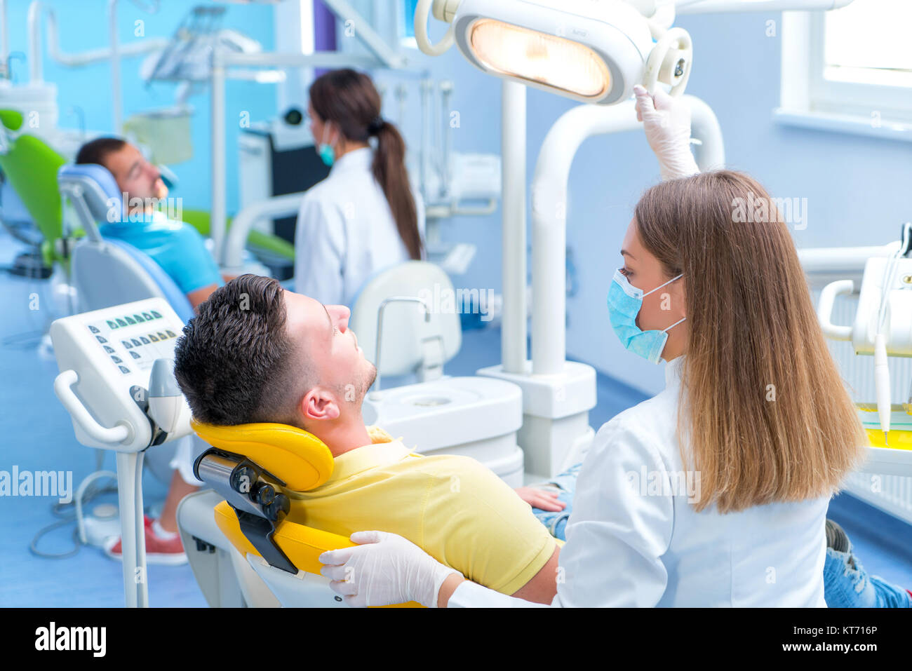 Doctor talking with her patient. Dentist concept Stock Photo - Alamy