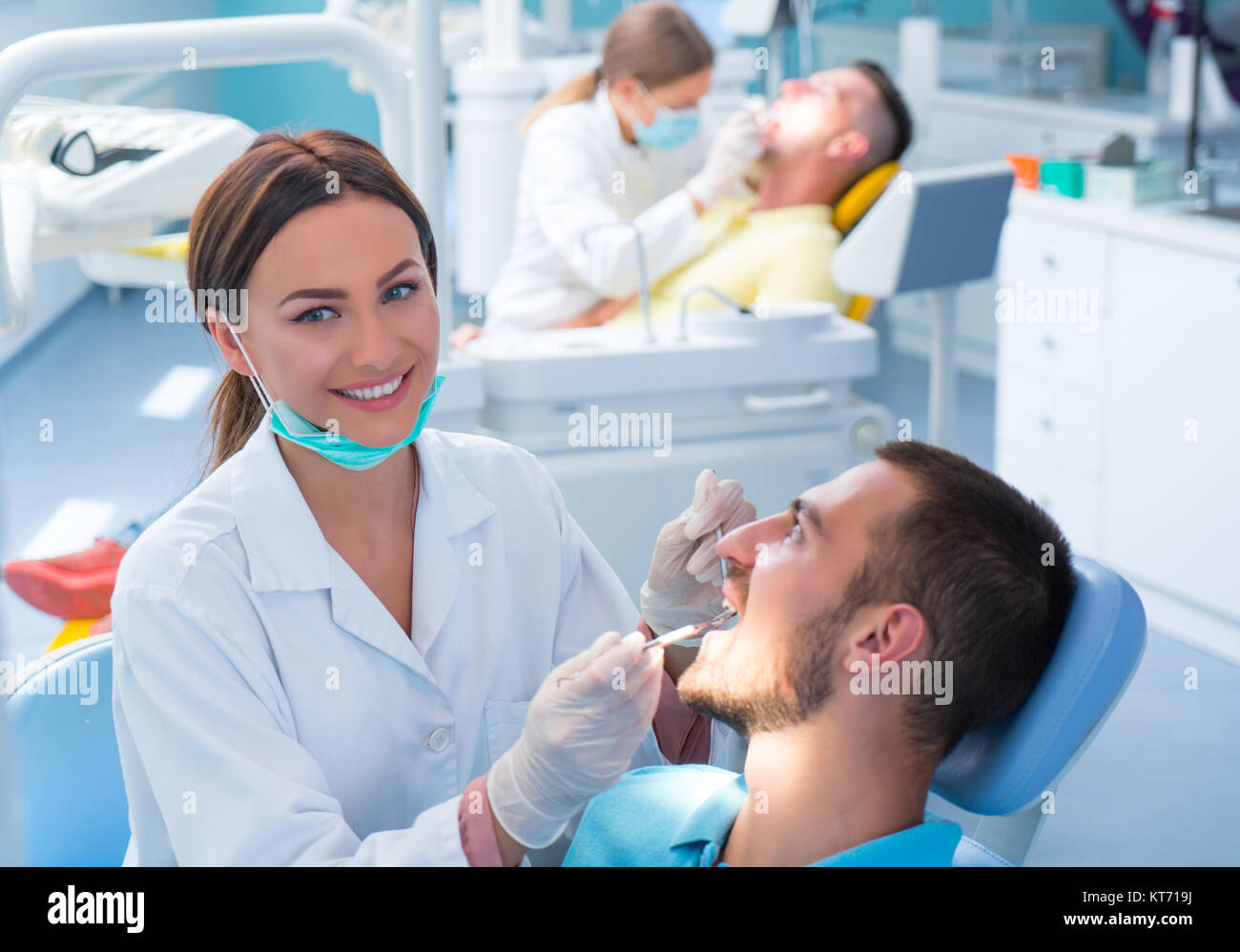 Doctor talking with her patient. Dentist concept Stock Photo - Alamy