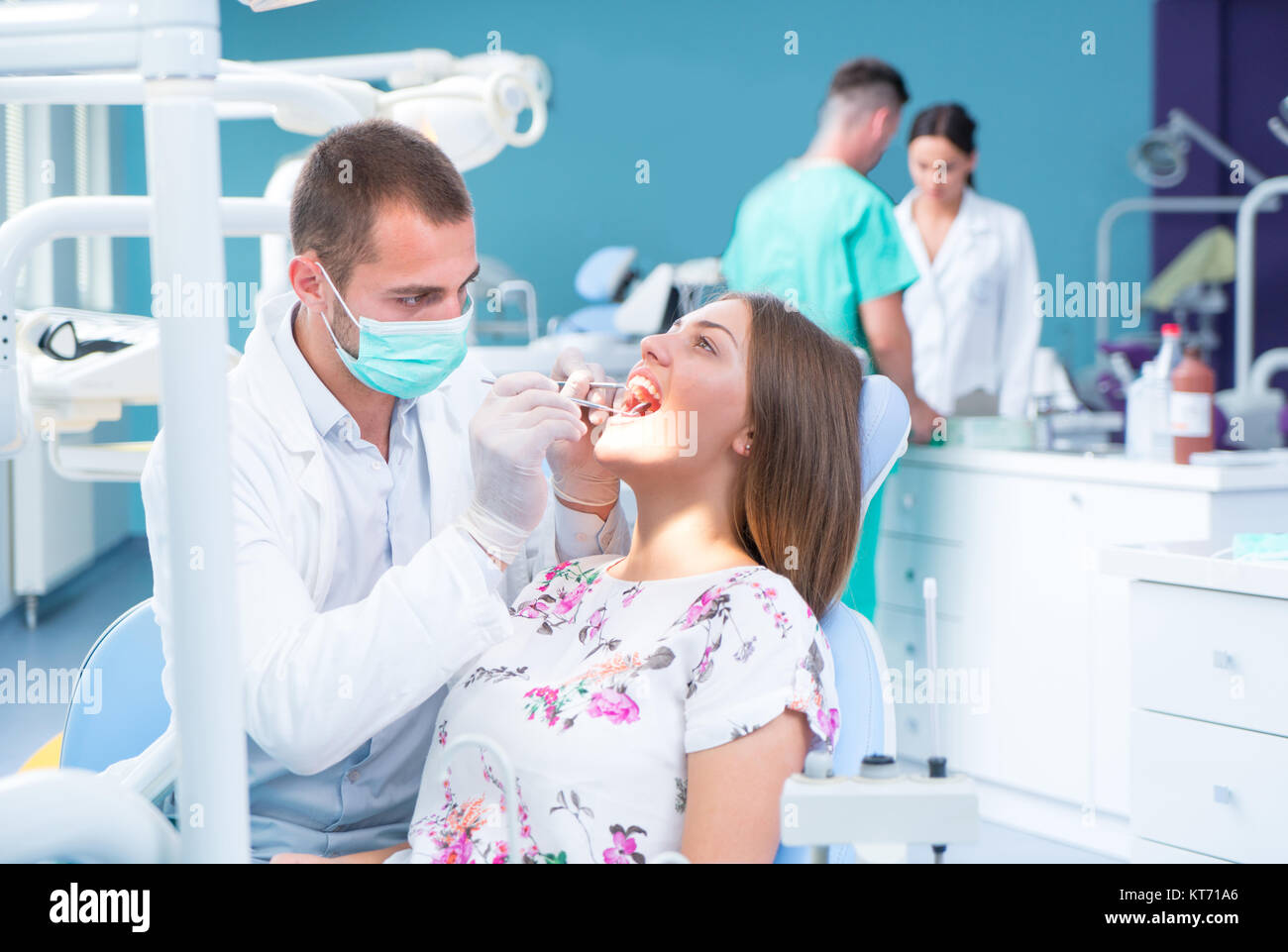 Doctor talking with her patient. Dentist concept Stock Photo - Alamy