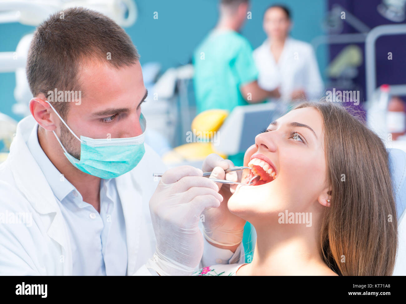Doctor talking with her patient. Dentist concept Stock Photo - Alamy