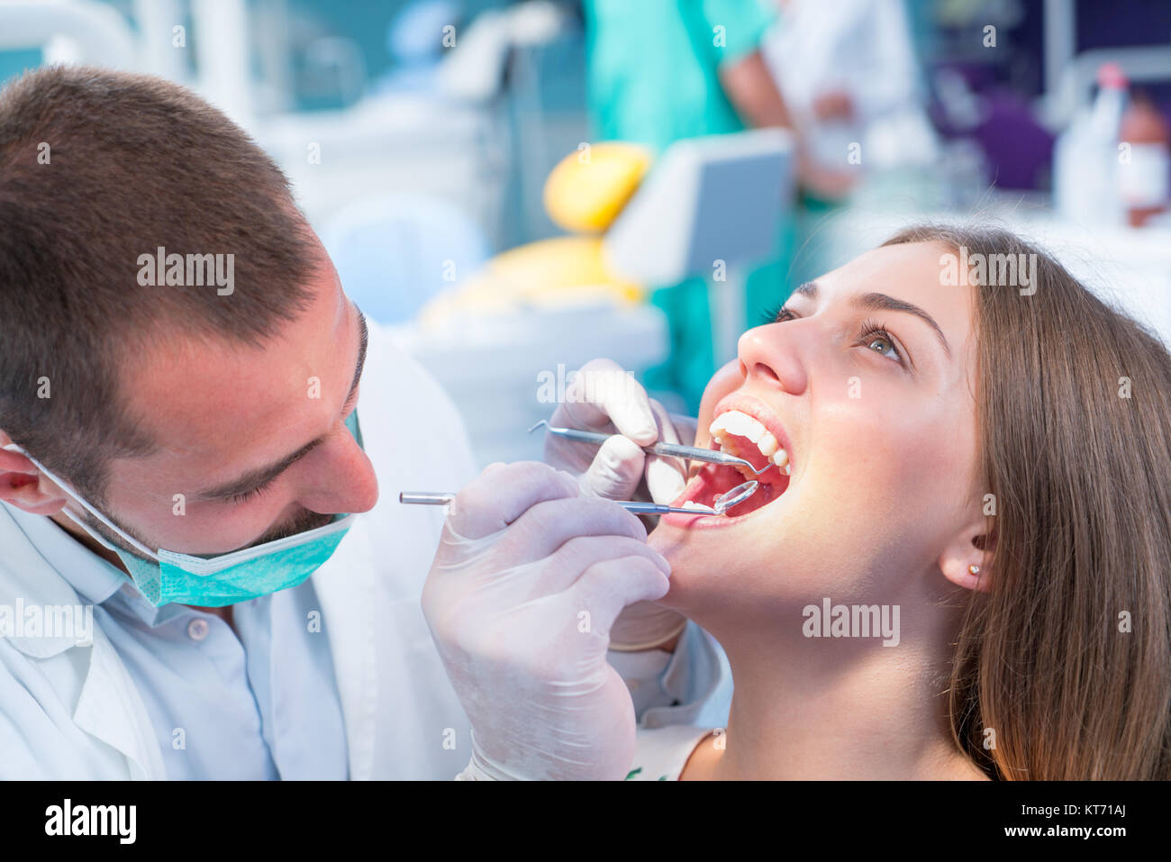 Doctor talking with her patient. Dentist concept Stock Photo - Alamy