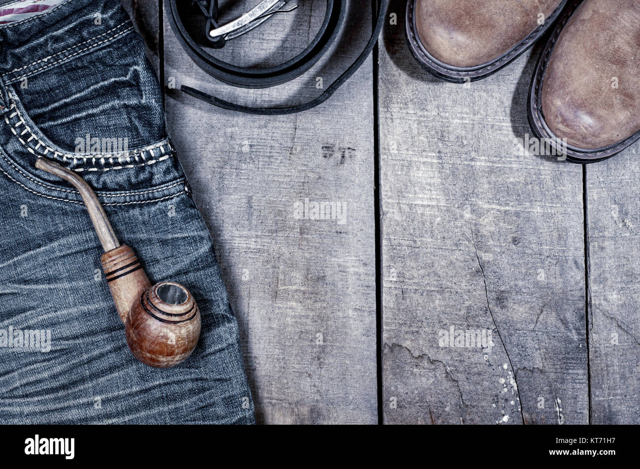 Wooden pipe for smoking on blue jeans Stock Photo - Alamy