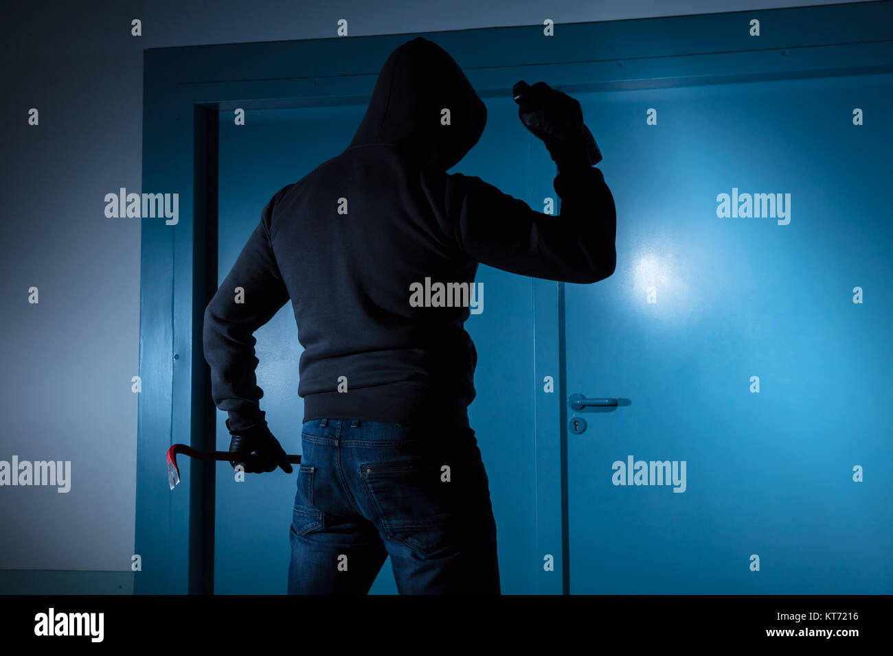 Thief Standing Outside The Door Stock Photo - Alamy