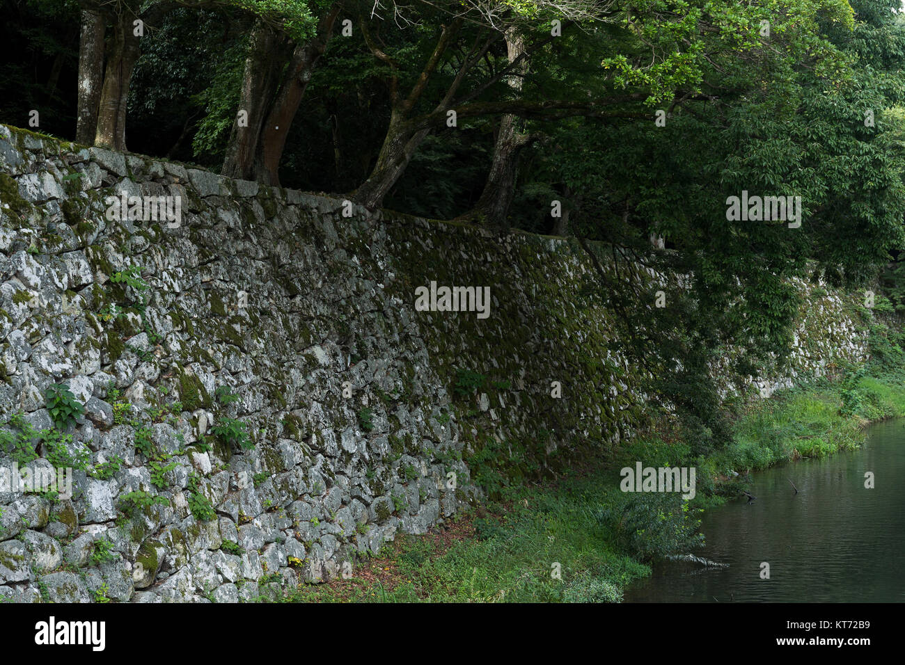 Stone wall and river Stock Photo - Alamy
