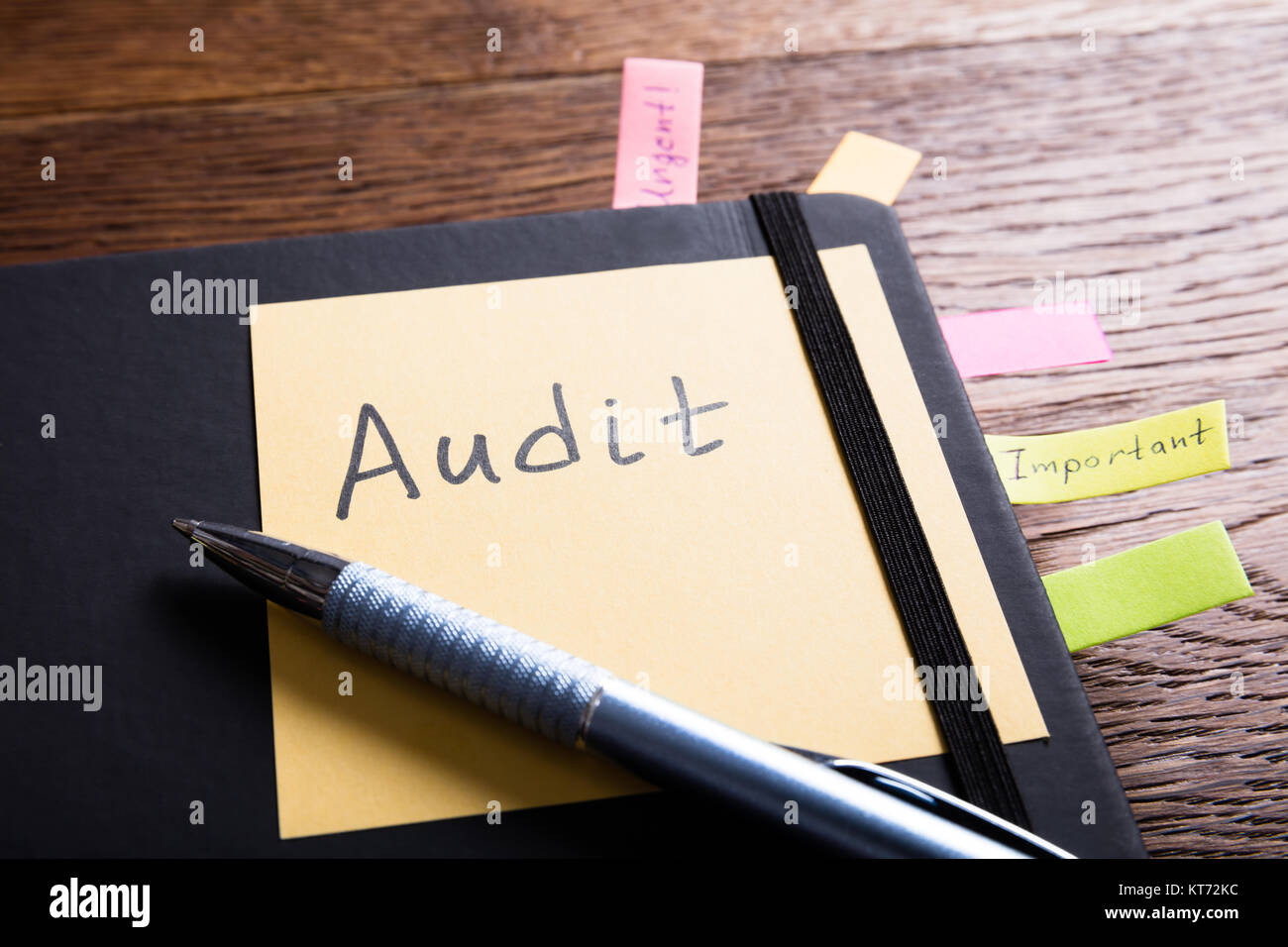 An Audit Diary With Sticky Note Stock Photo - Alamy