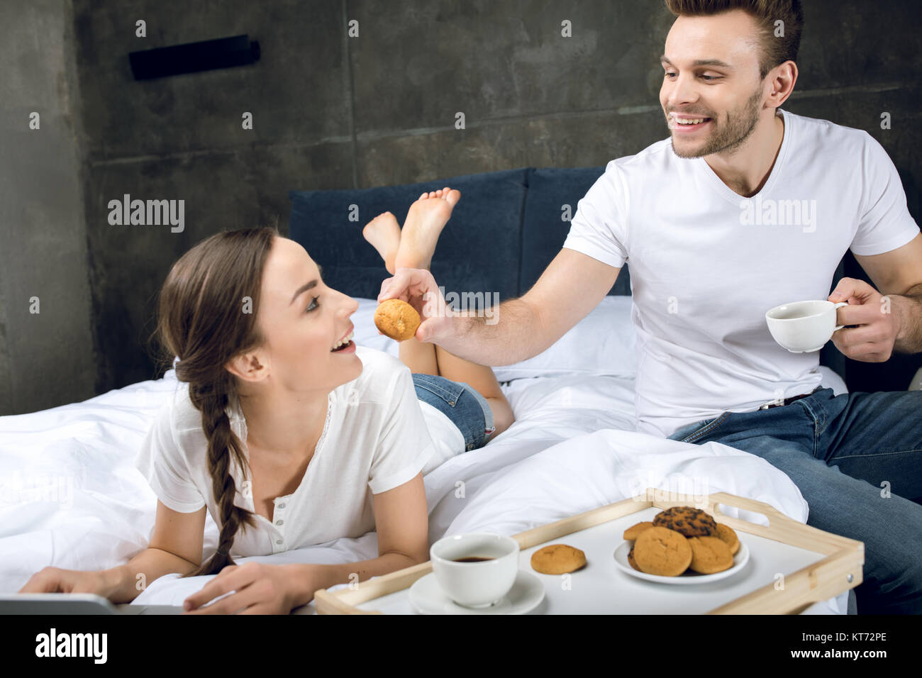 Young man giving cookies hi-res stock photography and images - Alamy