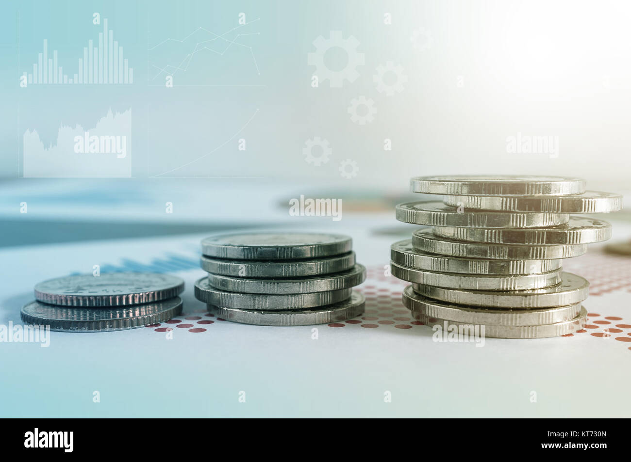 Coin stacks with financial graph hi-res stock photography and images ...