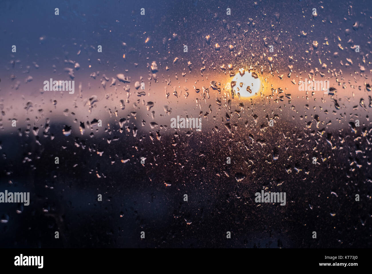 Unfocuced sun and water drops on the window Stock Photo - Alamy